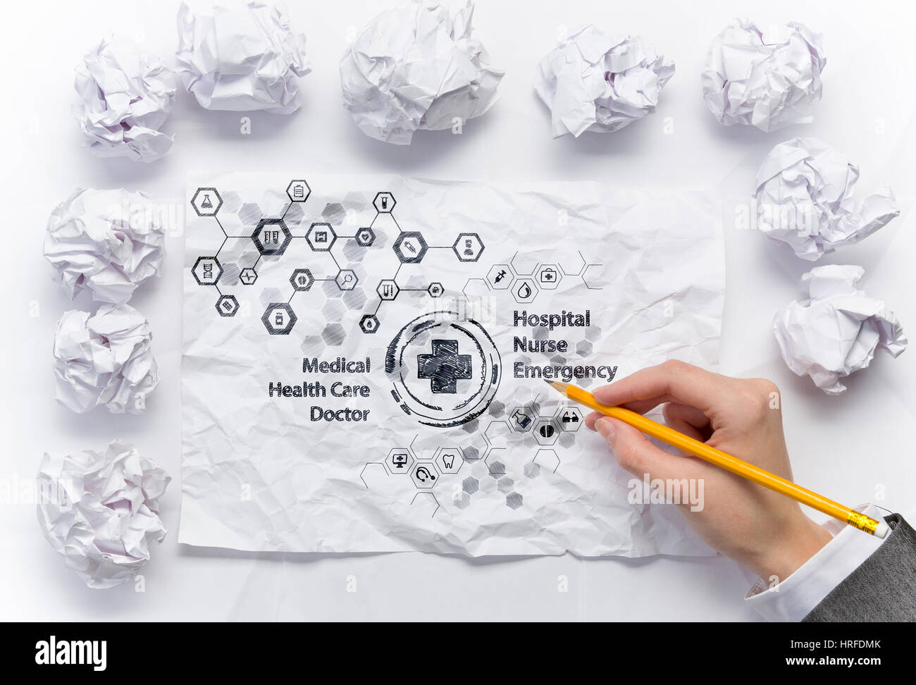 Hand drawing science and medicine concepts and crumpled paper balls ...