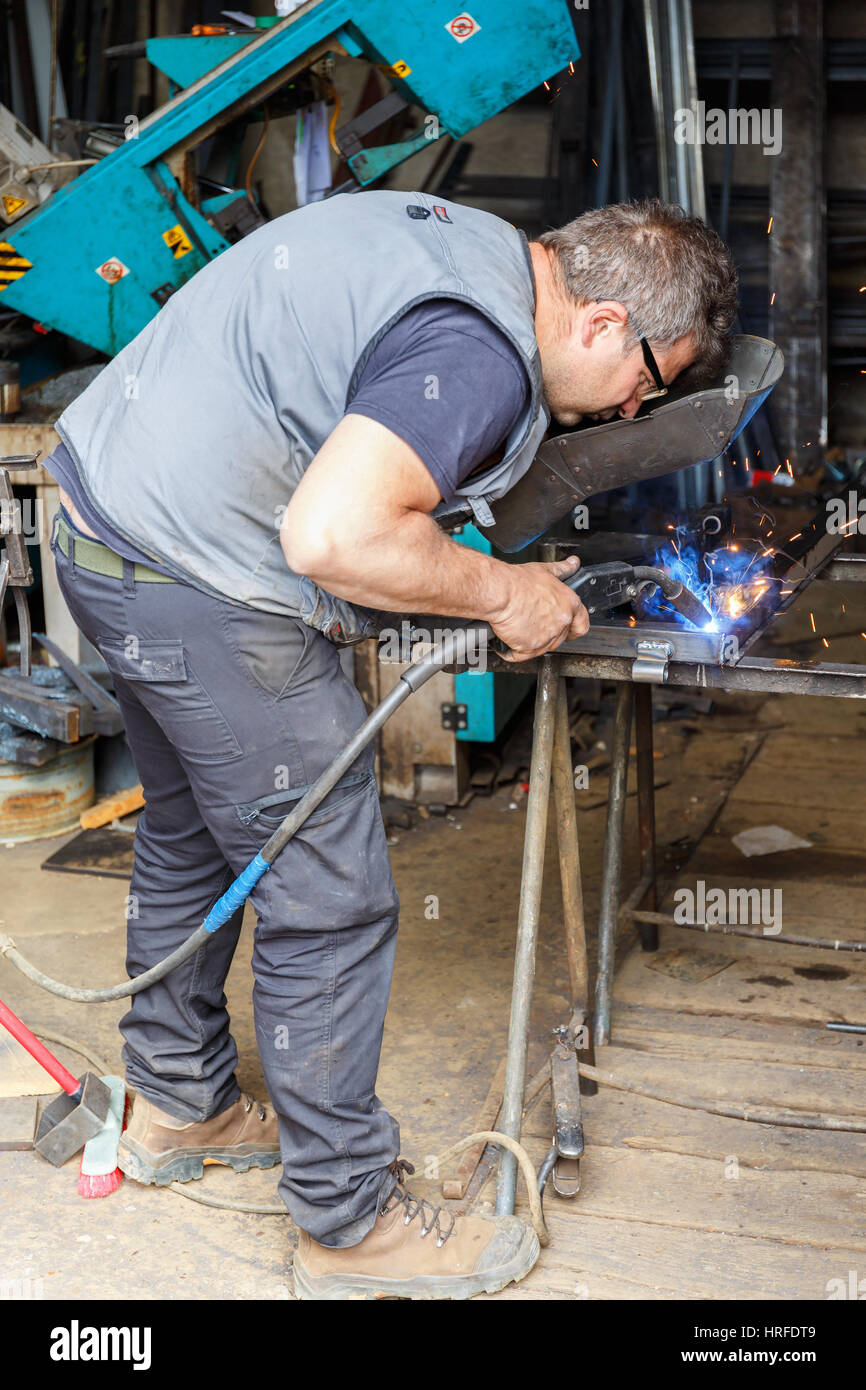 Welder perform hi-res stock photography and images - Alamy