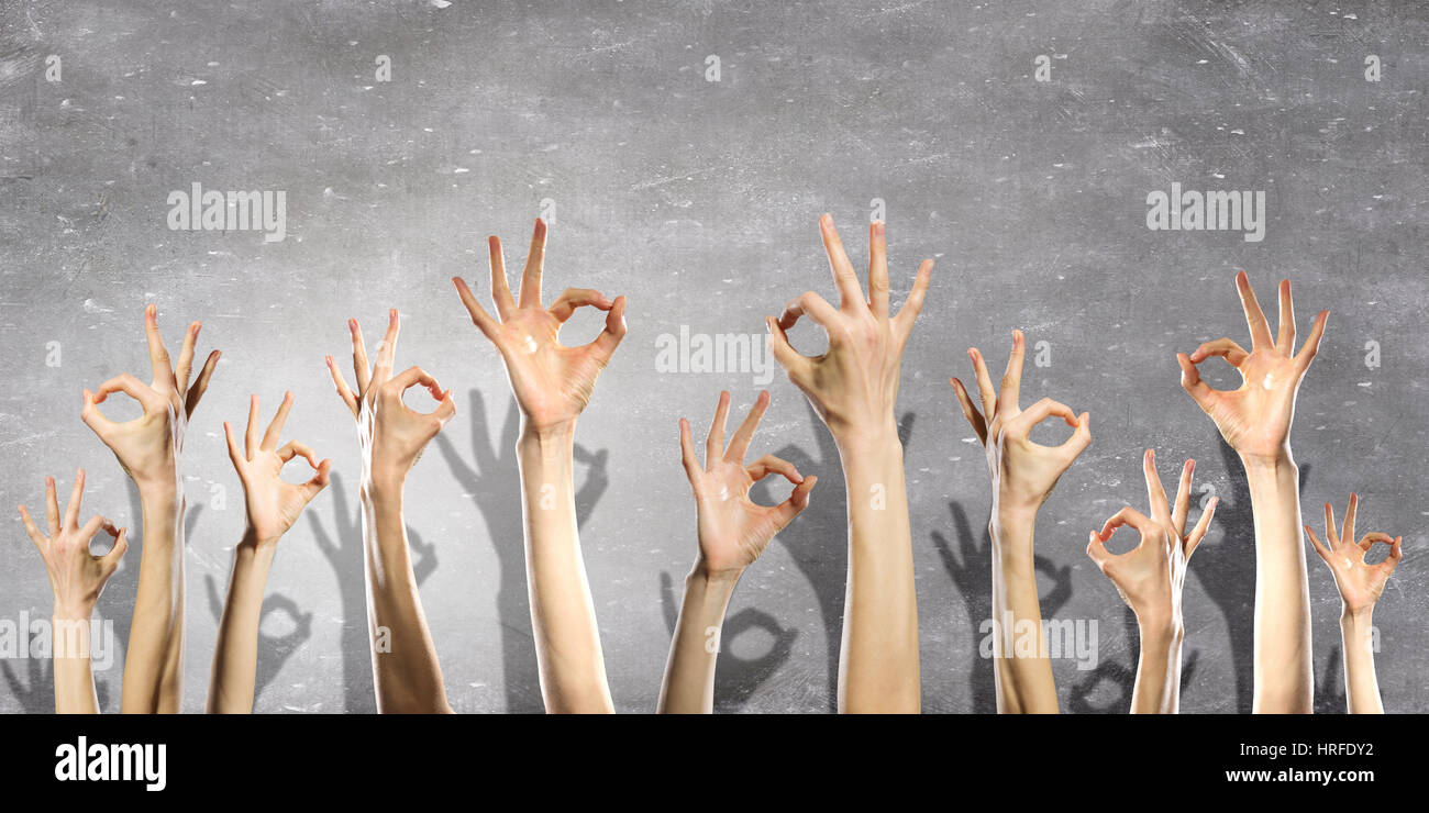 Row raised hands showing different hi-res stock photography and images ...