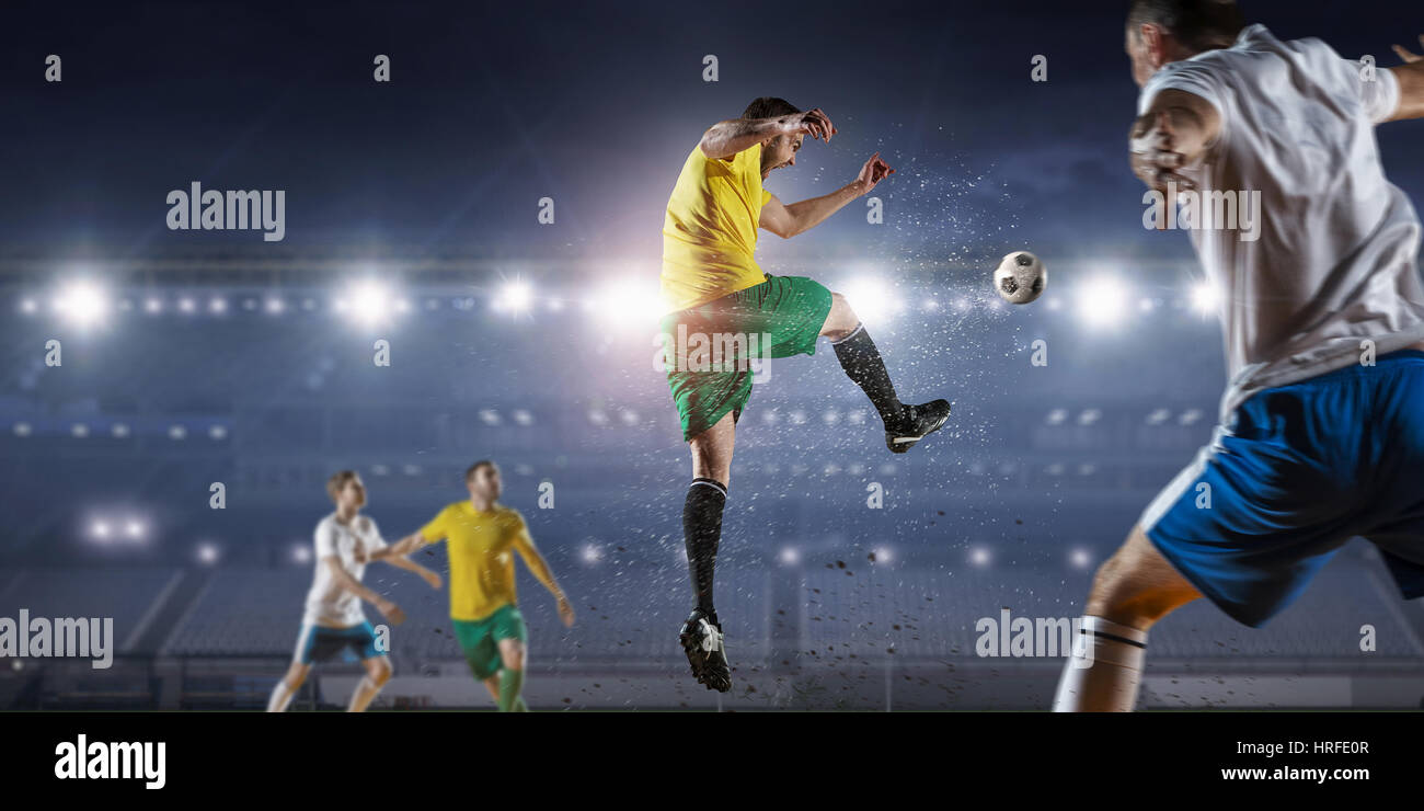 Soccer players in action on stadium fighting for ball. Mixed media ...