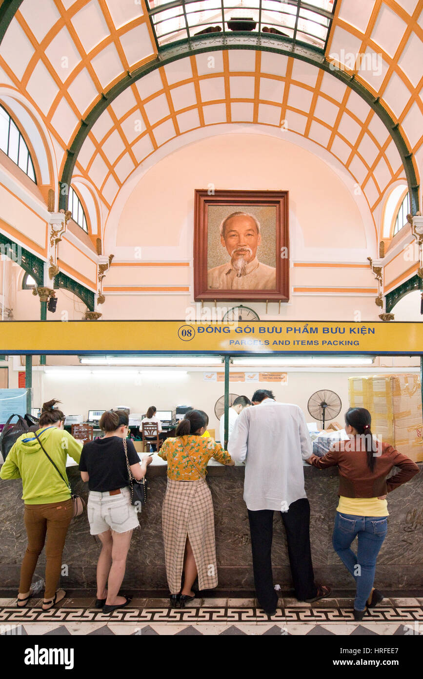 Local Vietnamese people posting a parcel inside the Central Post Office ...