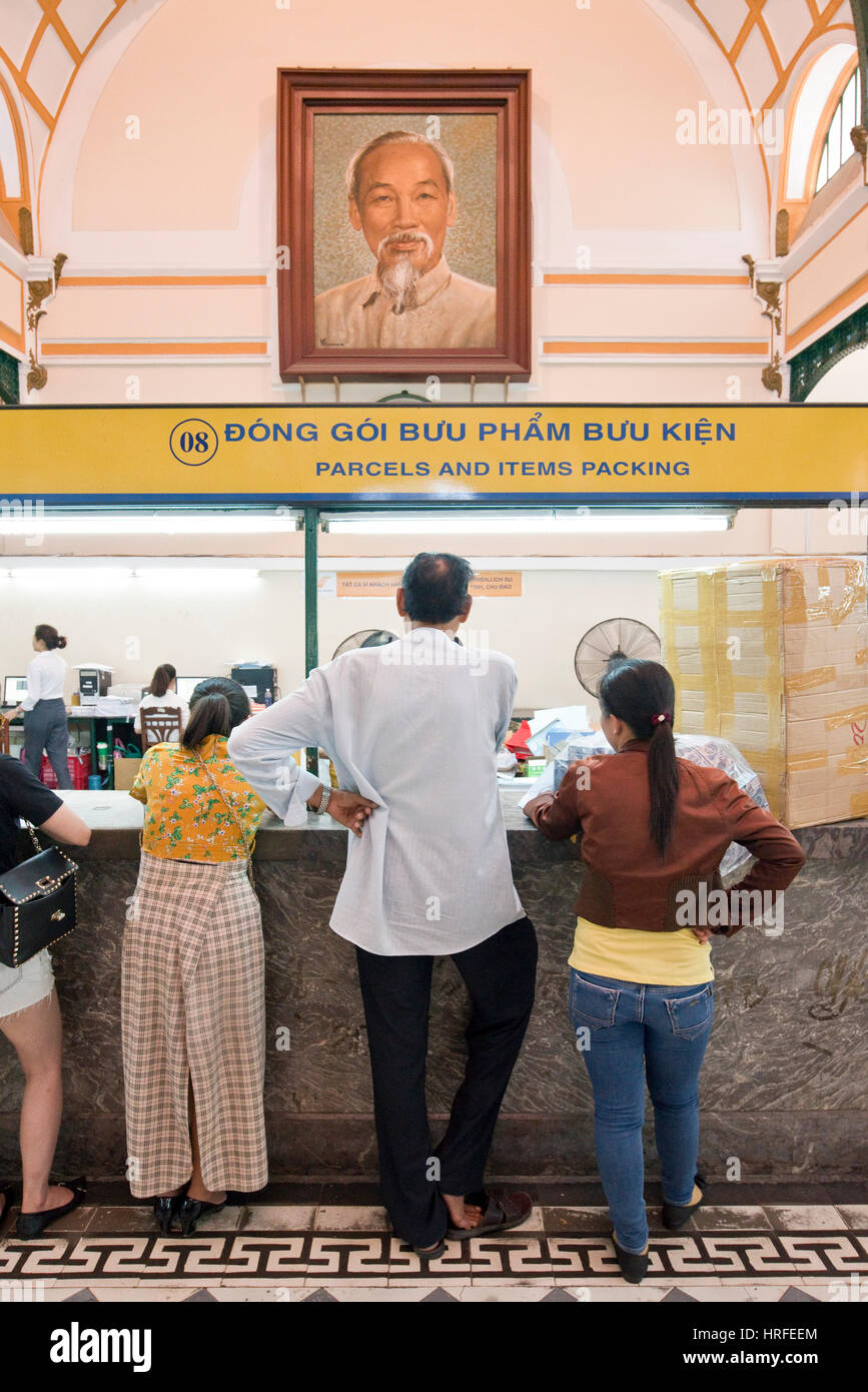 Local Vietnamese people posting a parcel inside the Central Post Office ...