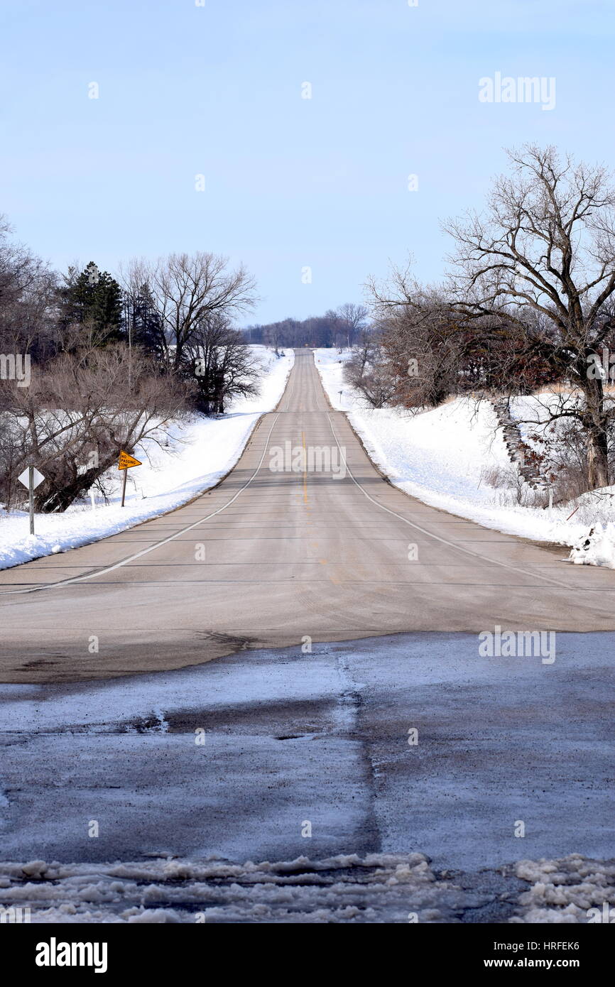 A long straight road leading to nowhere. The path ahead is unsure but ...