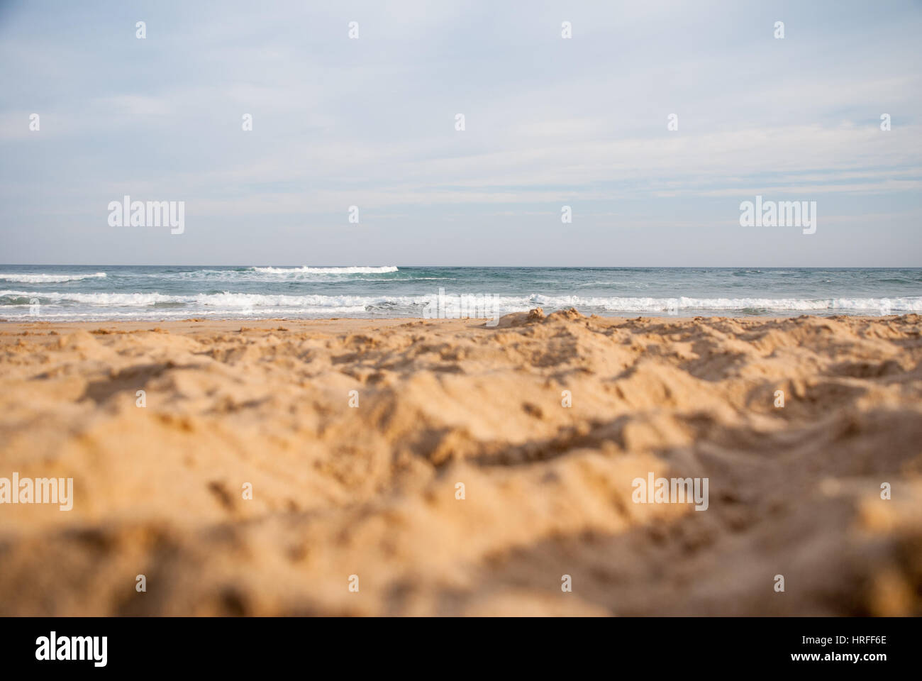 View of the ocean from sand level Stock Photo - Alamy