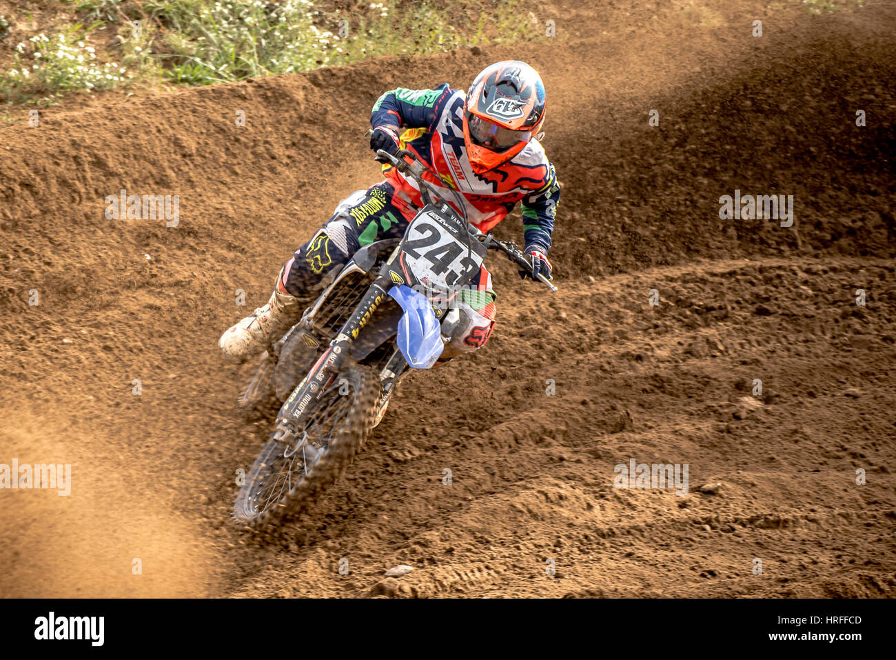 Motocross rider on the race Stock Photo - Alamy