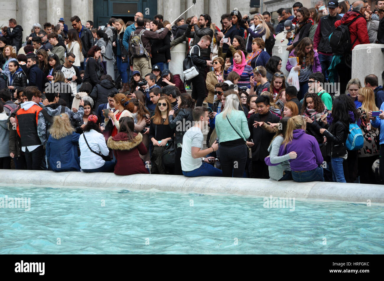 ROME, ITALY - MARCH 17, 2016: Crowd of tourists visiting and posing in ...