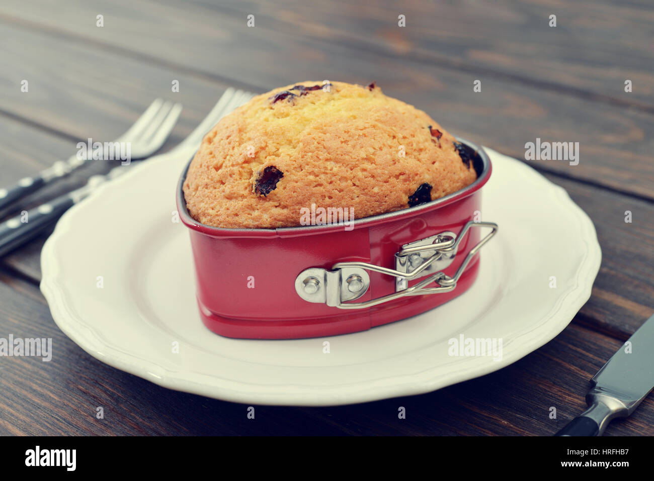 Freshly baked cranberry muffin in shape of heart Stock Photo - Alamy
