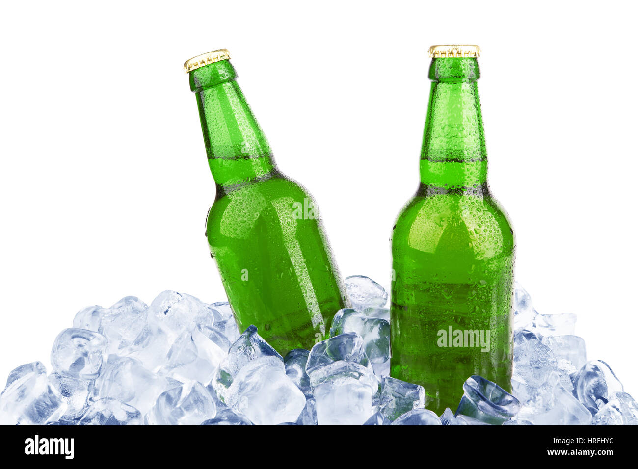 Two bottles of beer on ice isolated on white background Stock Photo - Alamy