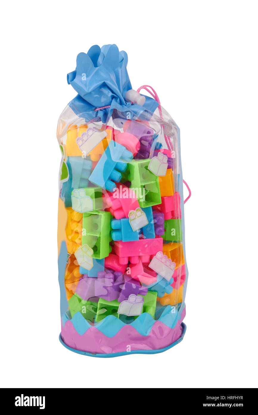 plastic building blocks in box on a white background Stock Photo - Alamy