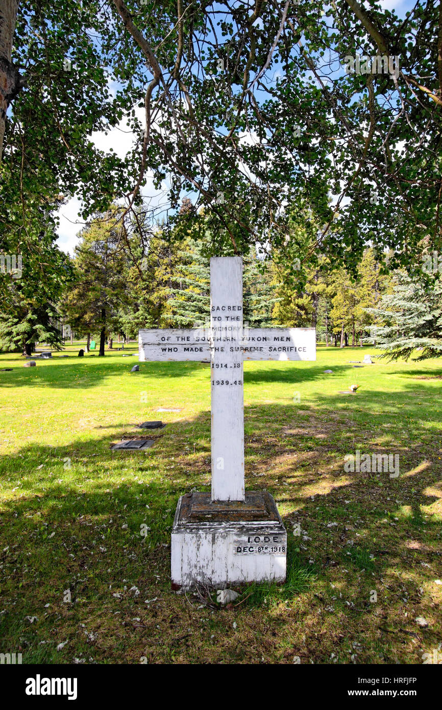 White Wood Cross with inscription: "Scared to the memory of the ...