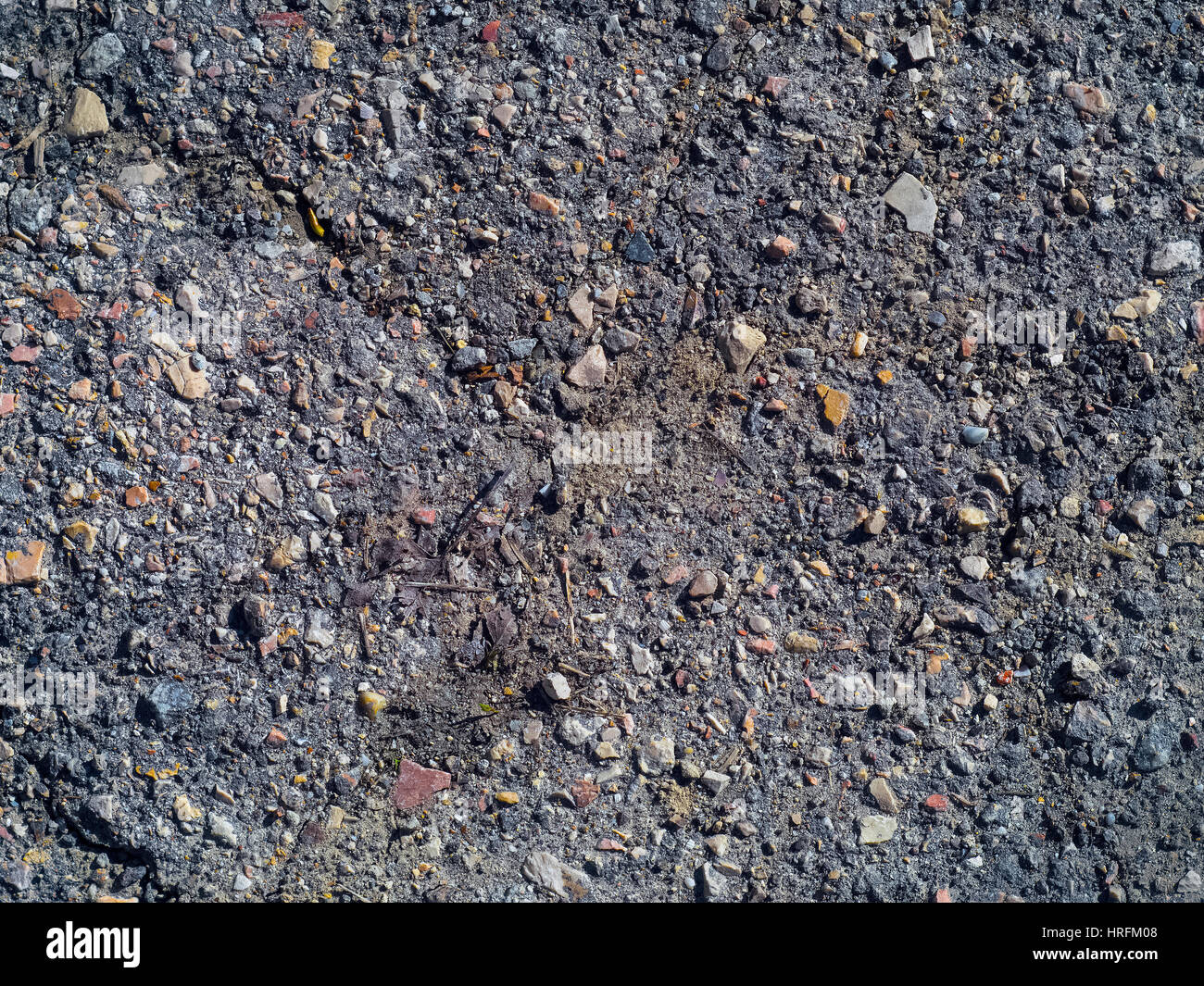 The texture of old asphalt with stones Stock Photo - Alamy