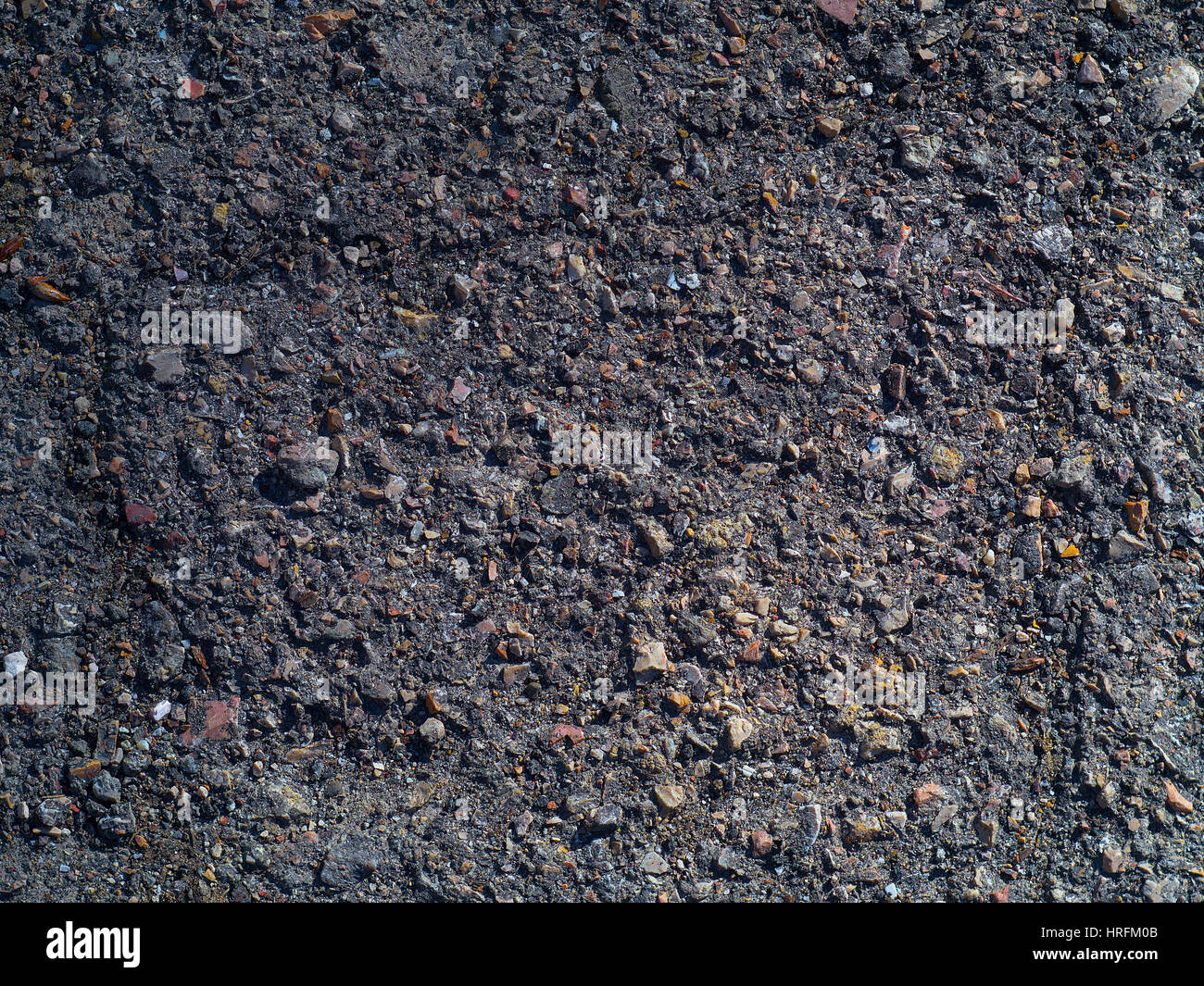The detailed texture of old asphalt with stones Stock Photo - Alamy