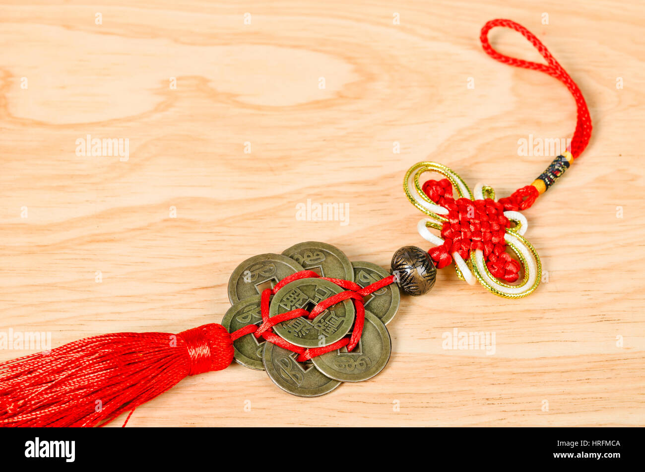 Chinese coins string hi-res stock photography and images - Alamy
