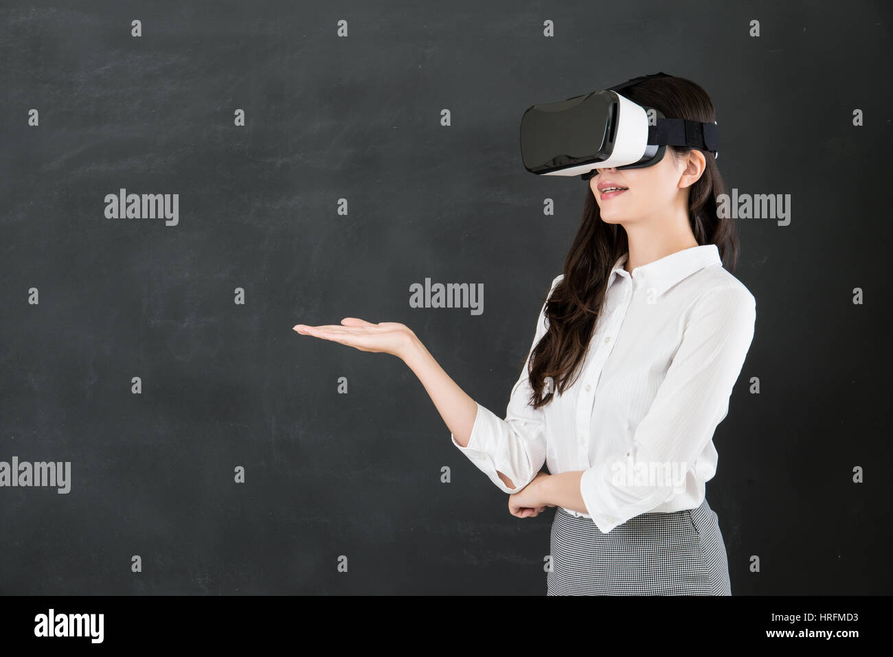 asian woman teacher presenting with virtual reality. VR headset glasses ...