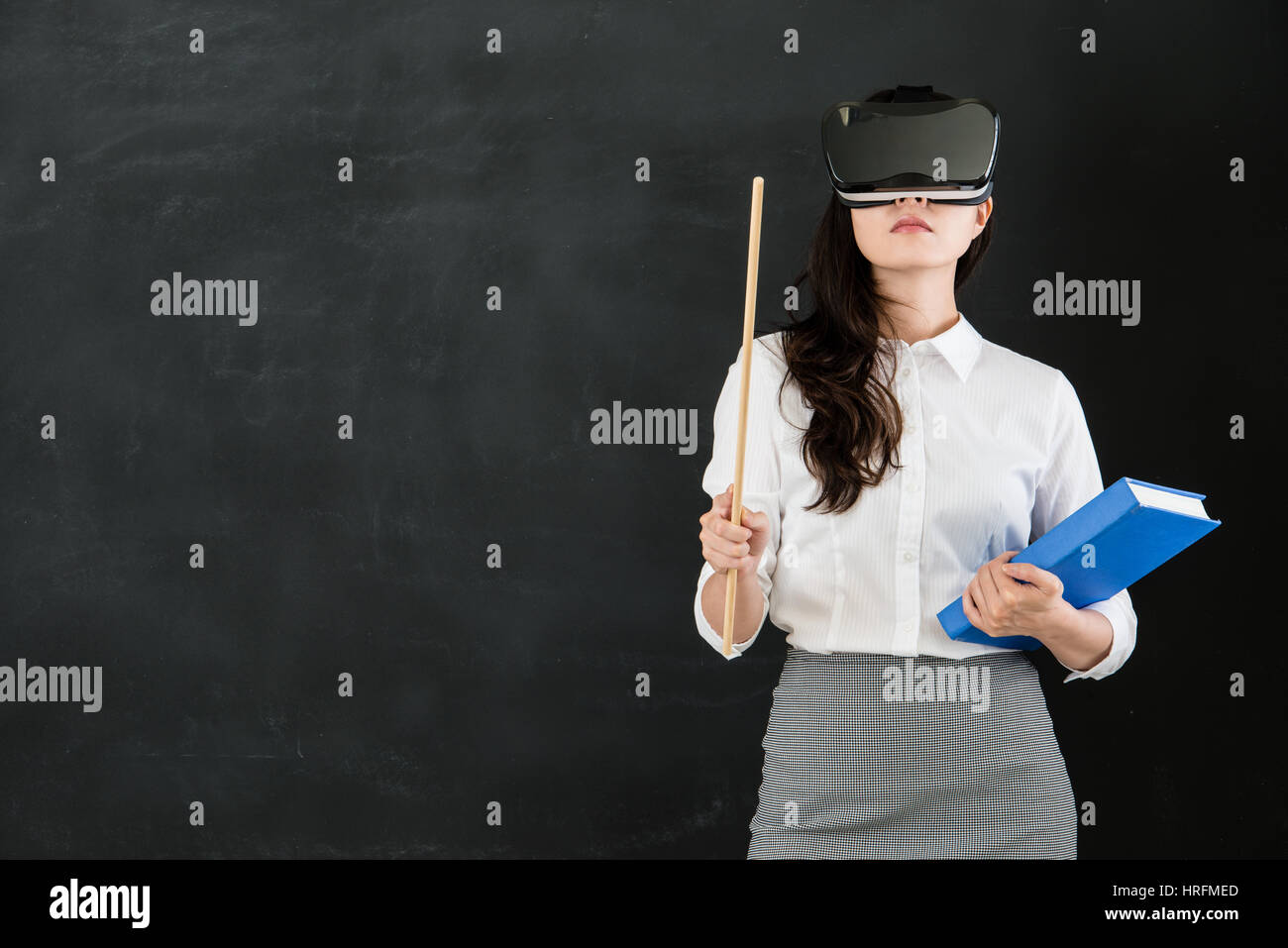 asian woman teacher teach with stick and virtual reality. VR headset ...