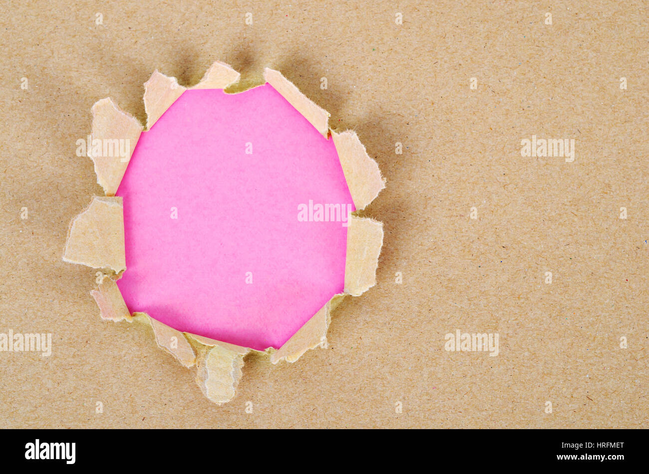 Brown Paper explosion on pink background and copyspace Stock Photo - Alamy