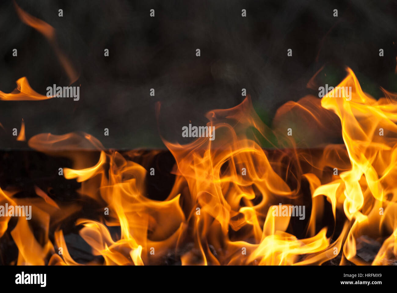 fire flames for background. Camping vacation food cooking Stock Photo ...