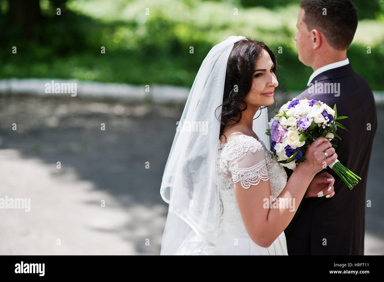 Magnificent wedding couple background green park in love Stock Photo ...