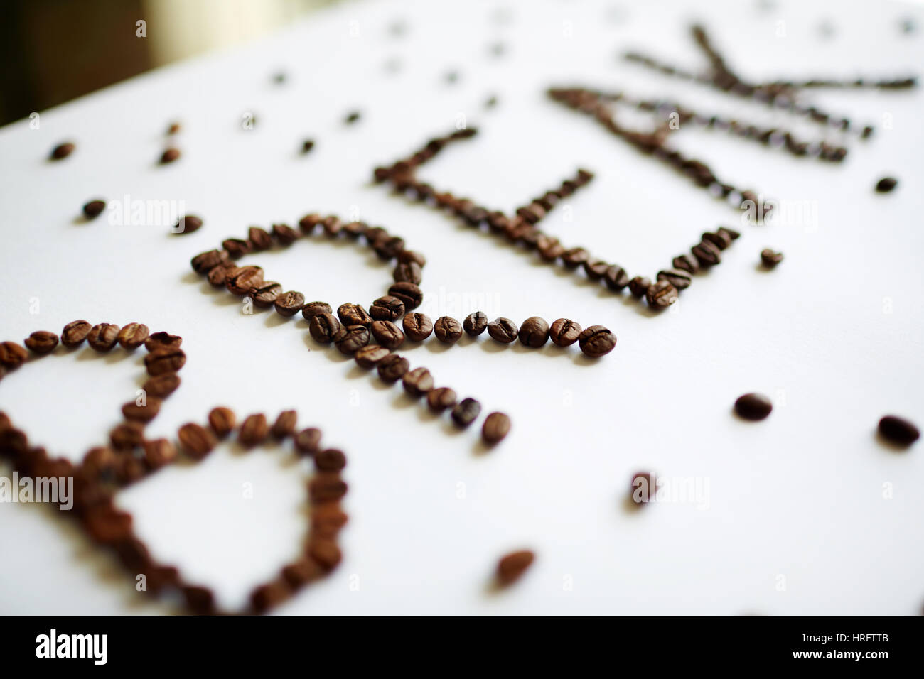 Creative coffee break concept: Word Break laid out on white table with ...