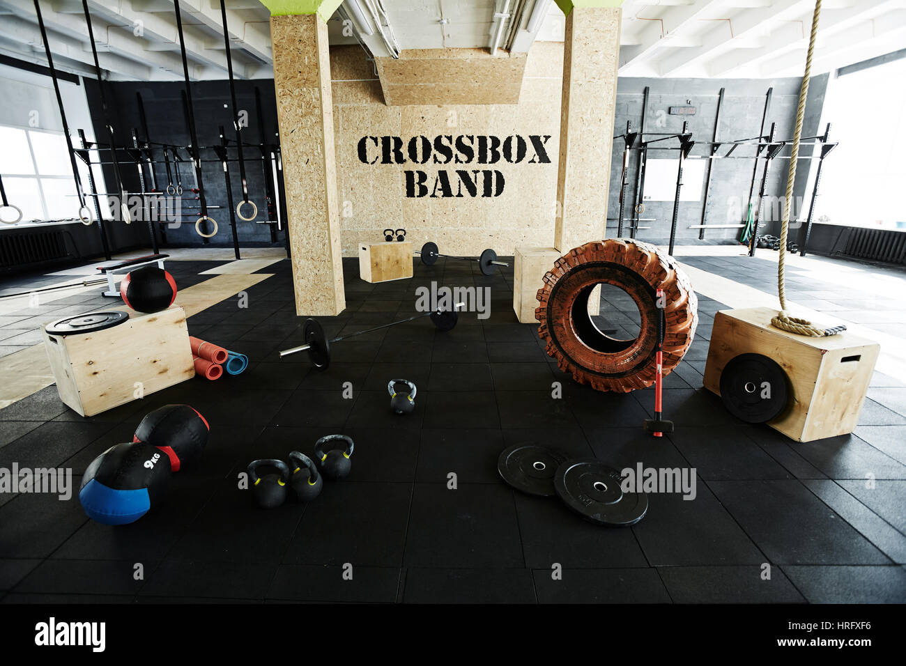 High angle shot of crossfit gym with modern equipment: wall mounted ...