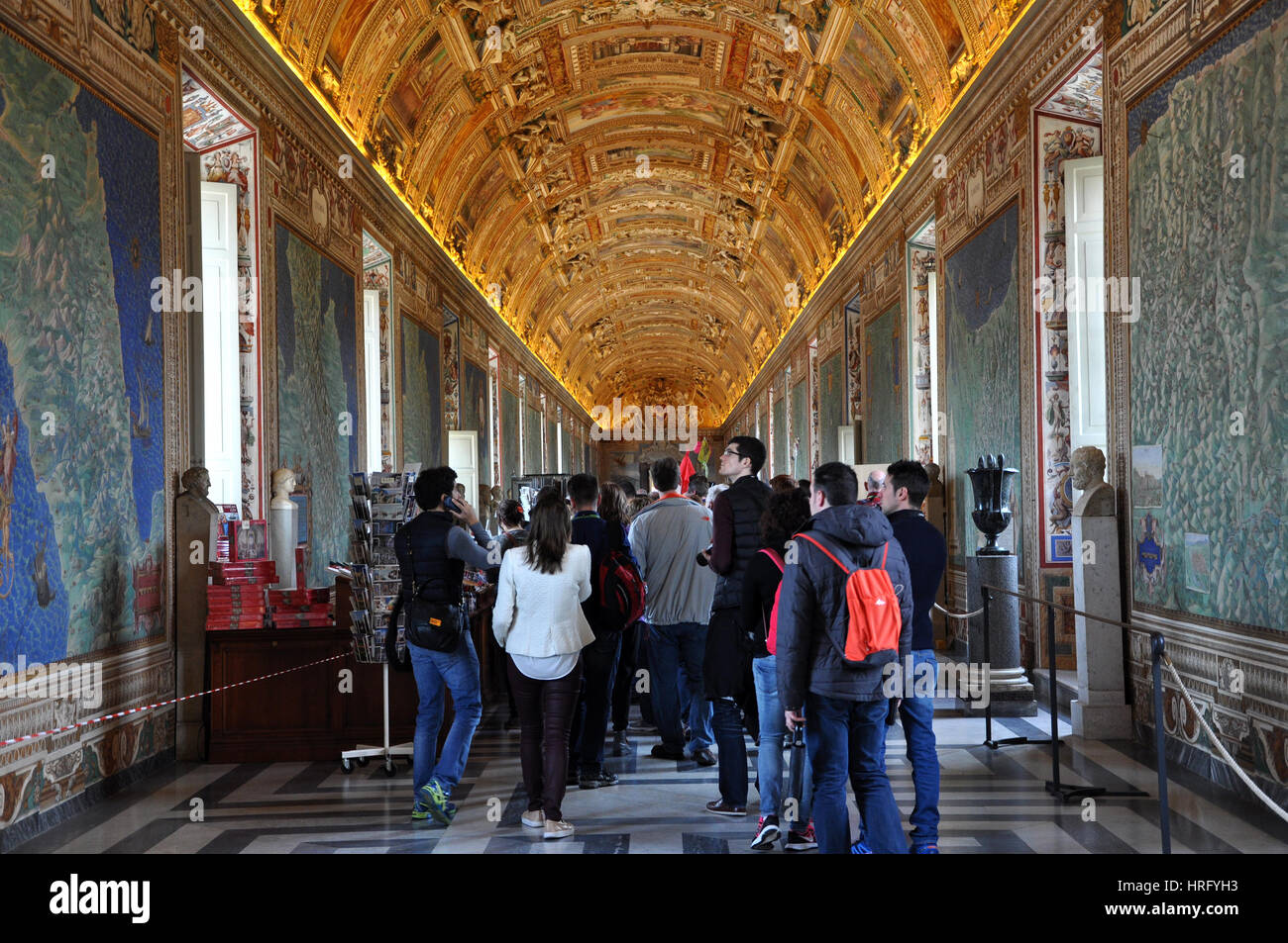 VATICAN, ITALY - MARCH 14, 2016: Tourists visiting the famous Gallery ...