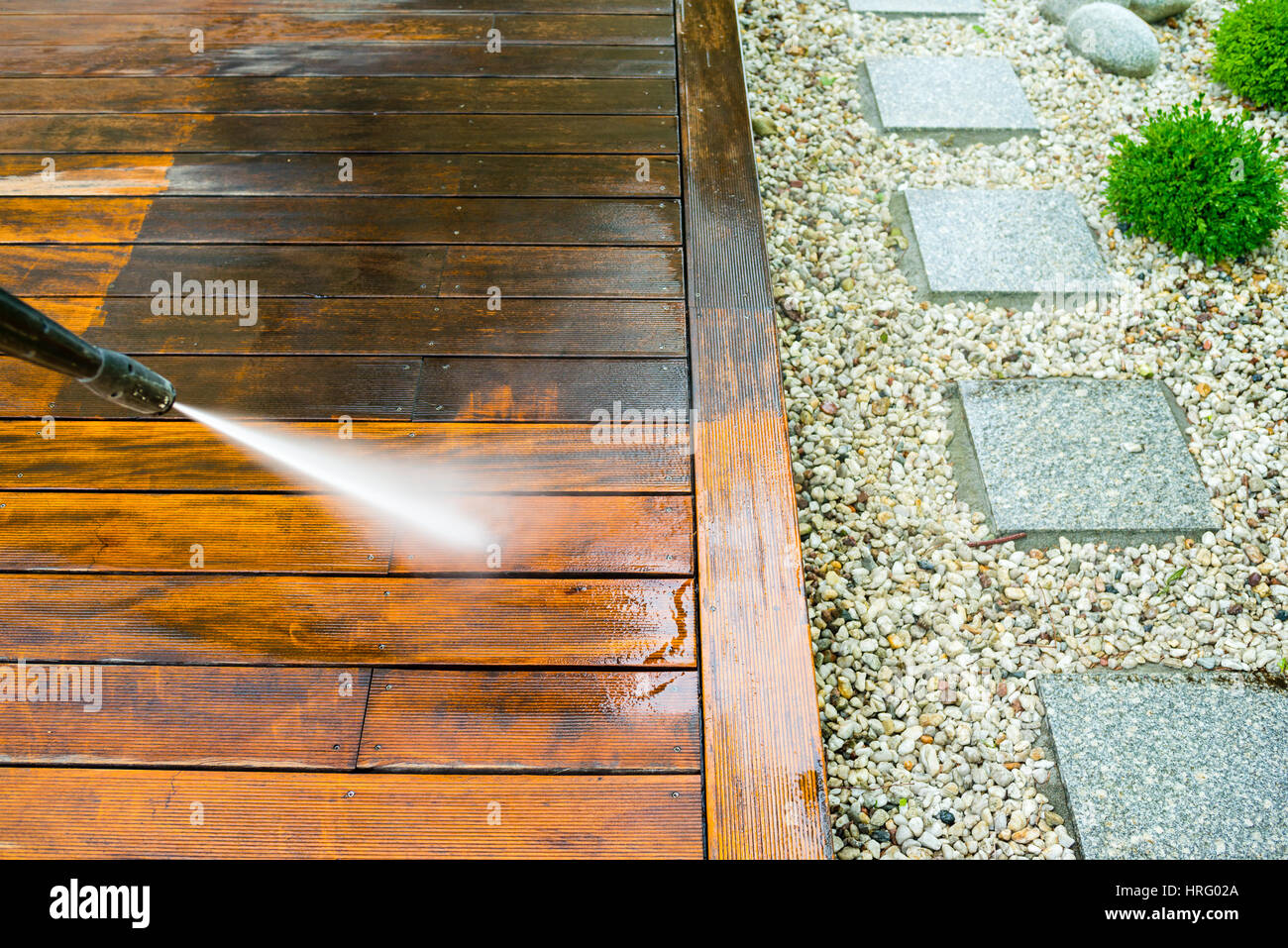 cleaning terrace with a power washer - high water pressure cleaner on ...