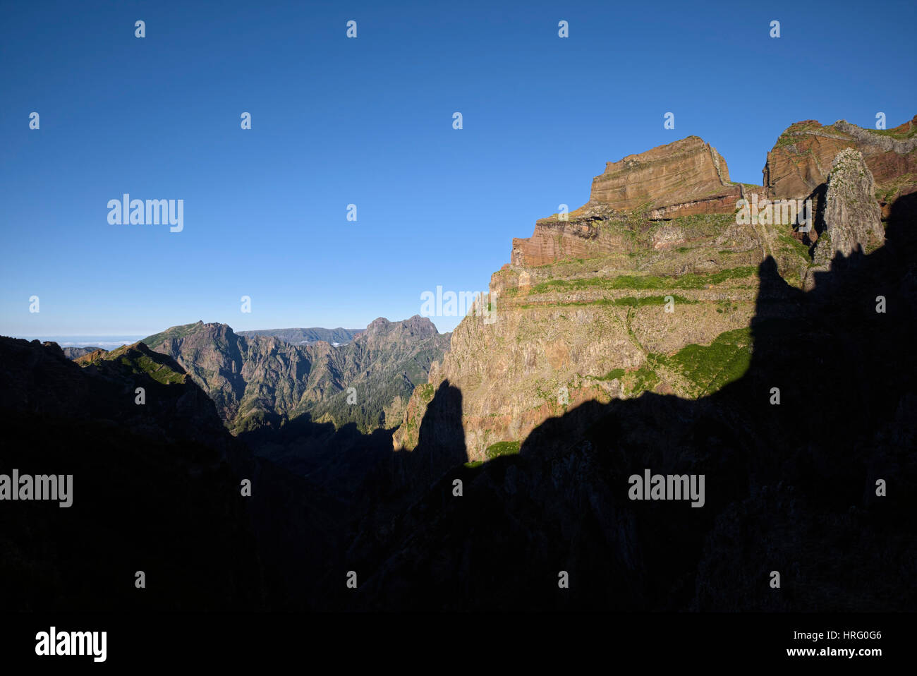 Mountains in light and shadow during the hike from Pico do Arieiro to ...