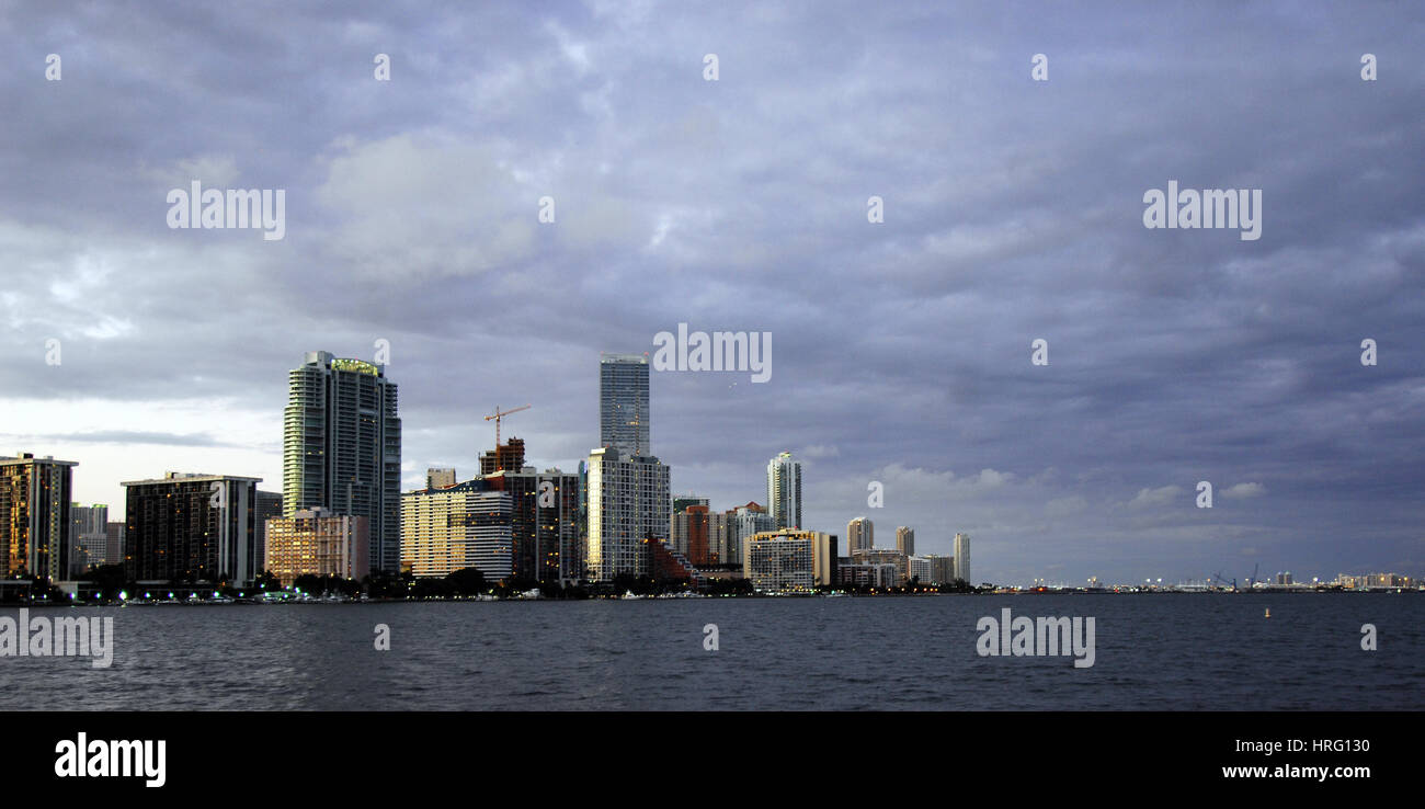 Miami cityscape skyline at dawn sunrise with dark clouds, Florida, USA ...
