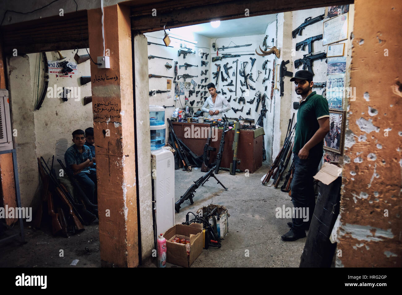 A young Gunsmith in his workshop ithe the centre of Erbil, Kurdistan ...