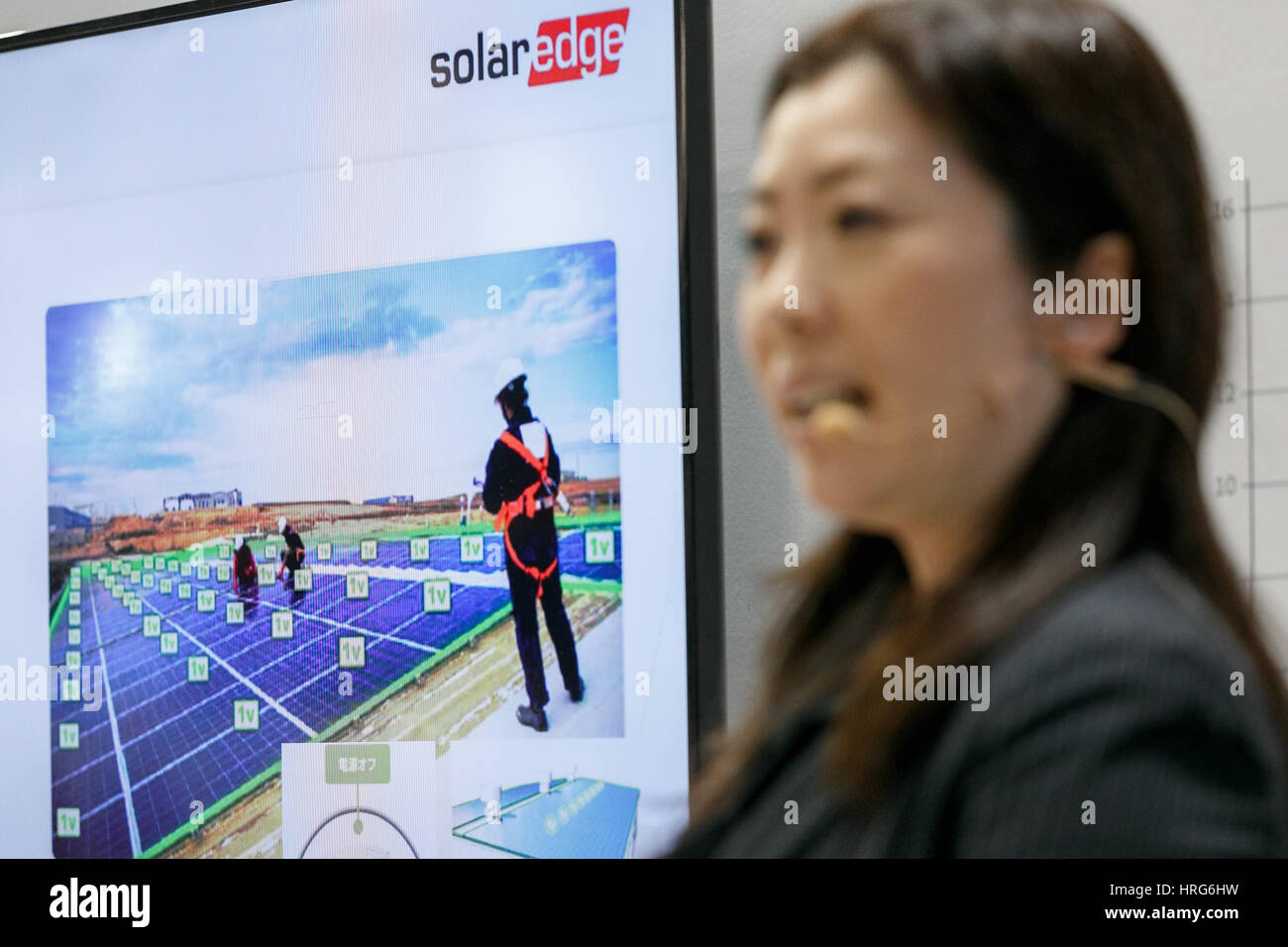 Tokyo, Japan. 1st Mar, 2017. An exhibitor speaks about solar panel ...