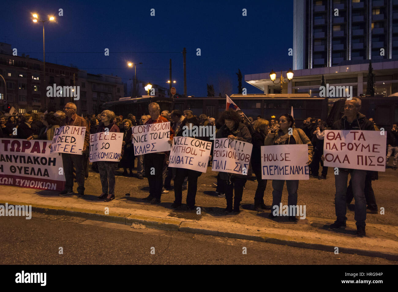 Athens, Greece. 1st Mar, 2017. Protesters wave flags and shout slogans ...