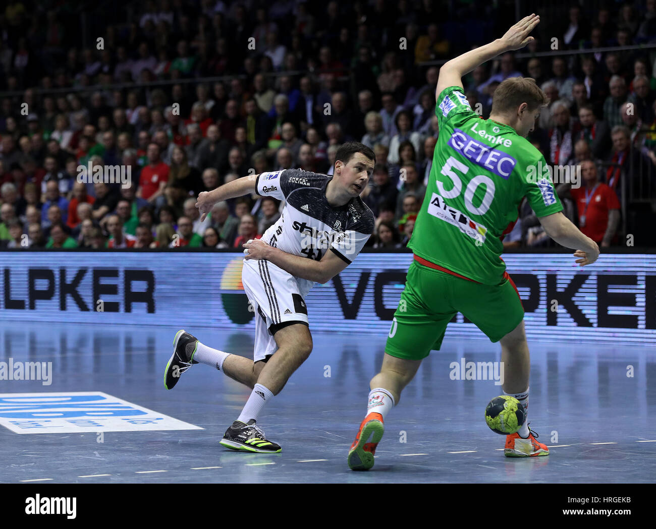 Magdeburg, Germany. 01st Mar, 2017. Kiel's Marko Vujin (L) and ...