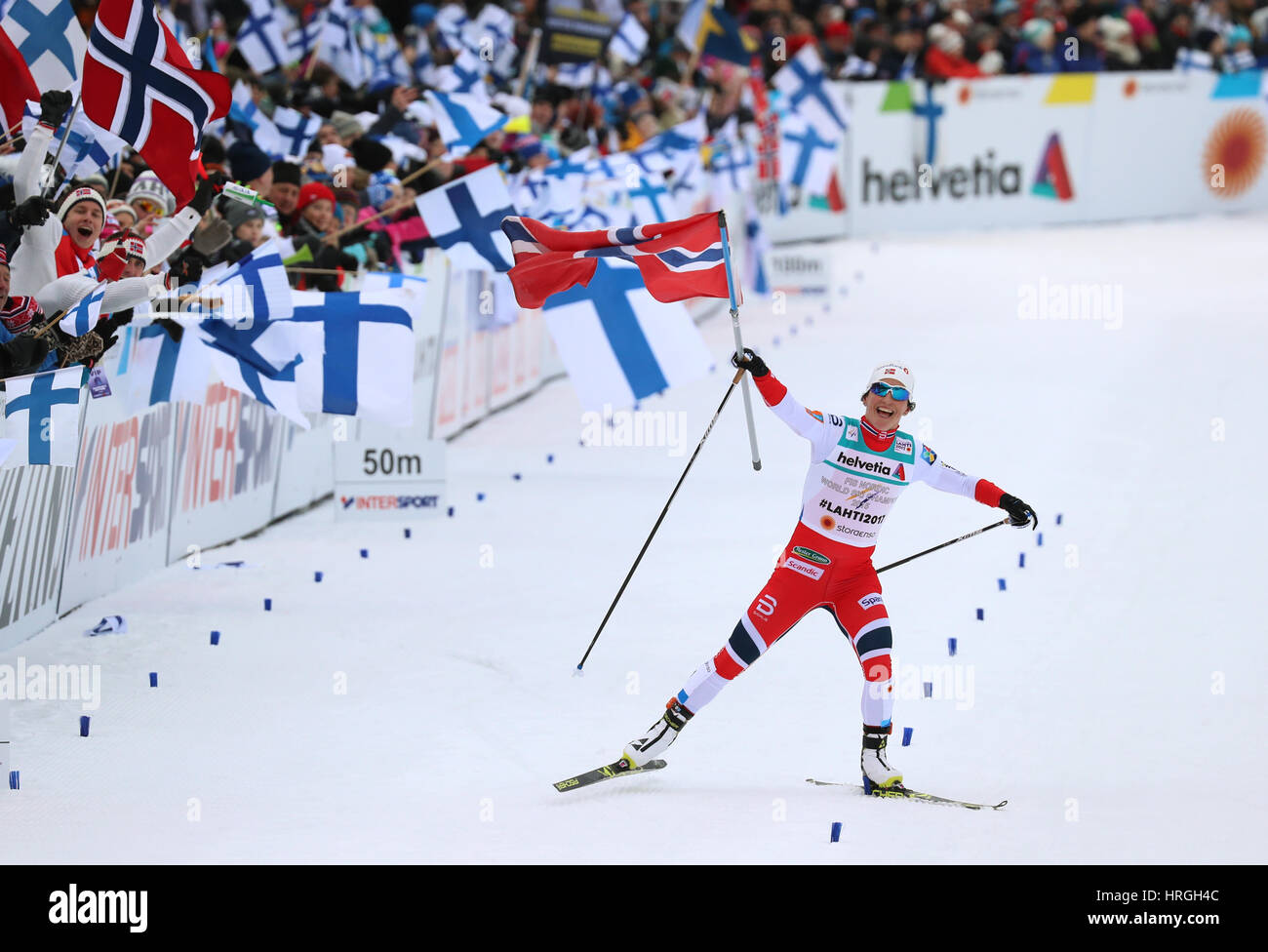 Marit Bjoergen from Norway celebrates after the women's 4x5 km cross ...