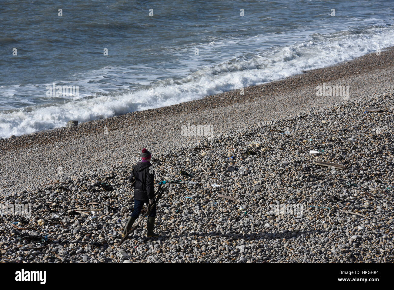 Portland, Dorset, UK. 2nd Mar, 2017. UK Weather. Beach combers scavenge ...