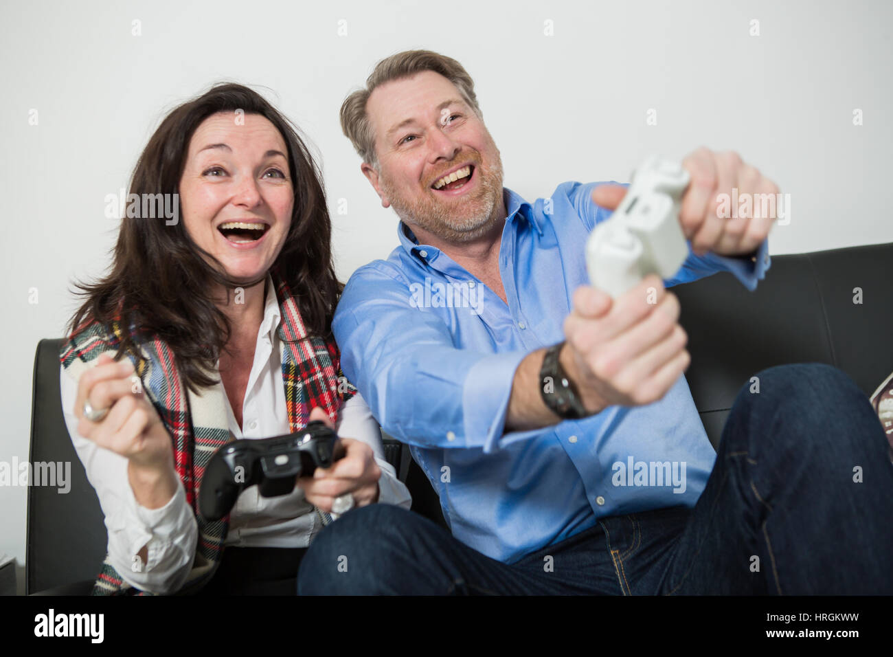 couple playing computer game Stock Photo - Alamy