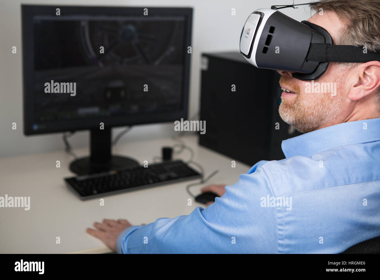 Man gaming with VR Headset Stock Photo - Alamy Man gaming with VR Headset Stock Photo - Alamy