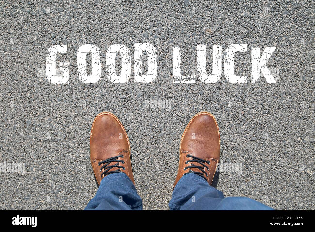 Feet on the street with text Stock Photo - Alamy