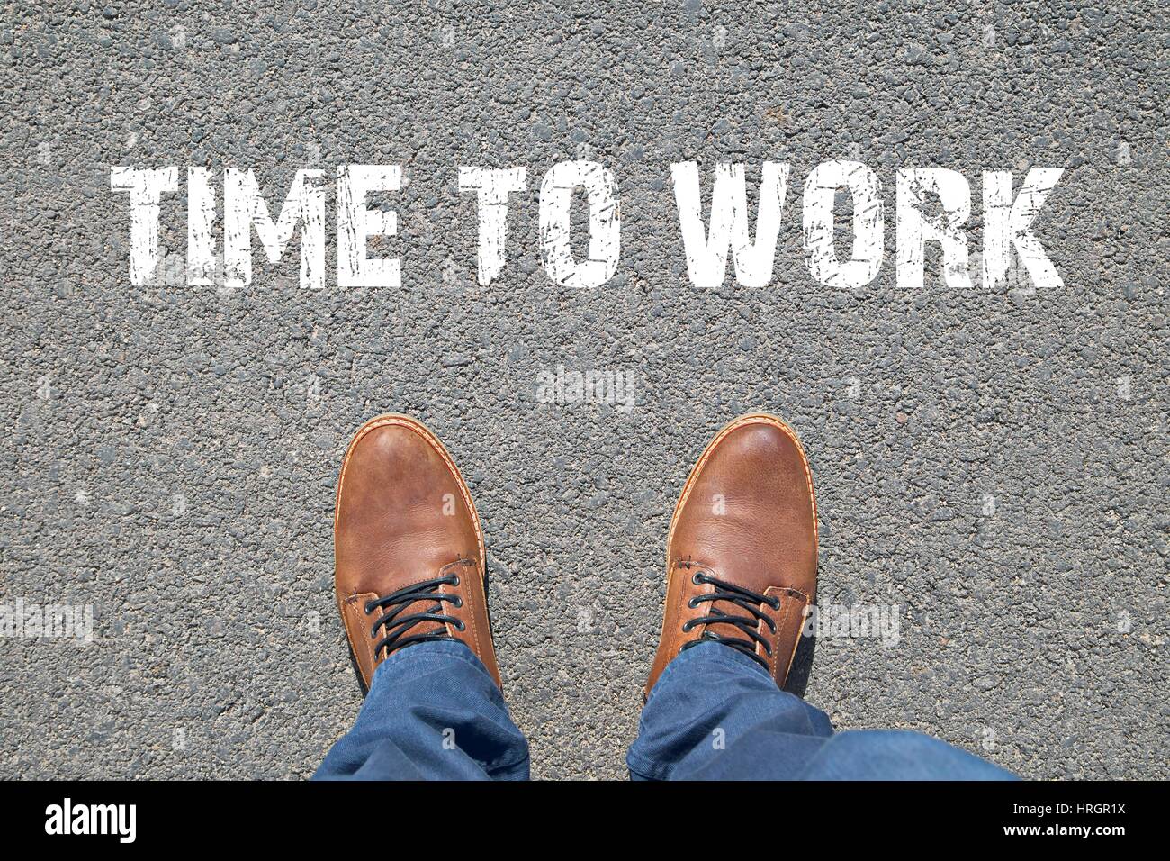 Feet on the street with text Stock Photo - Alamy