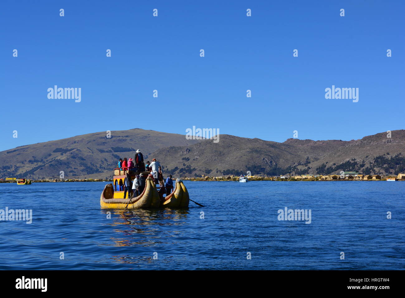 Typical peruvian boat (aka Totora boat) in the island of Uros, Titicaca ...