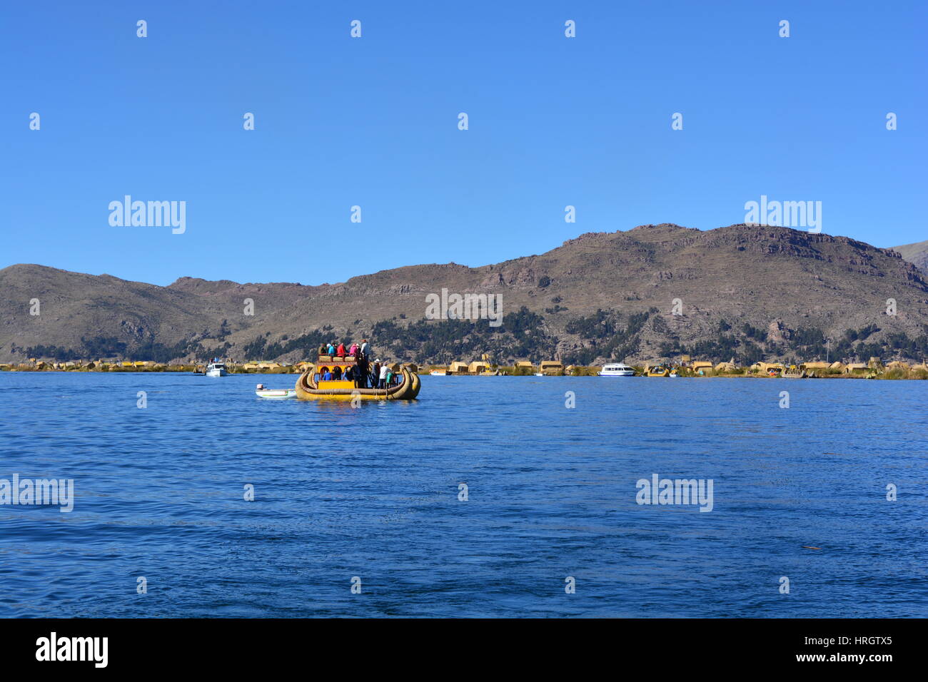 Typical peruvian boat (aka Totora boat) in the island of Uros, Titicaca ...