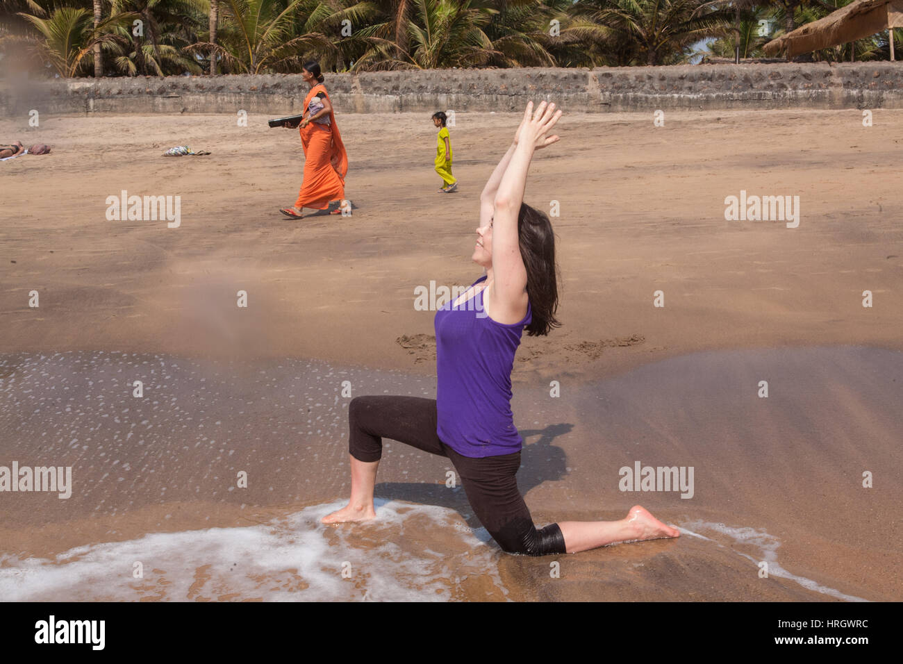 Meditating on a beach in goa hi-res stock photography and images - Alamy