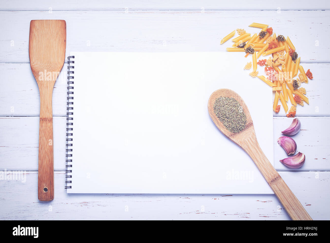 Open recipe book with ingredients Stock Photo - Alamy