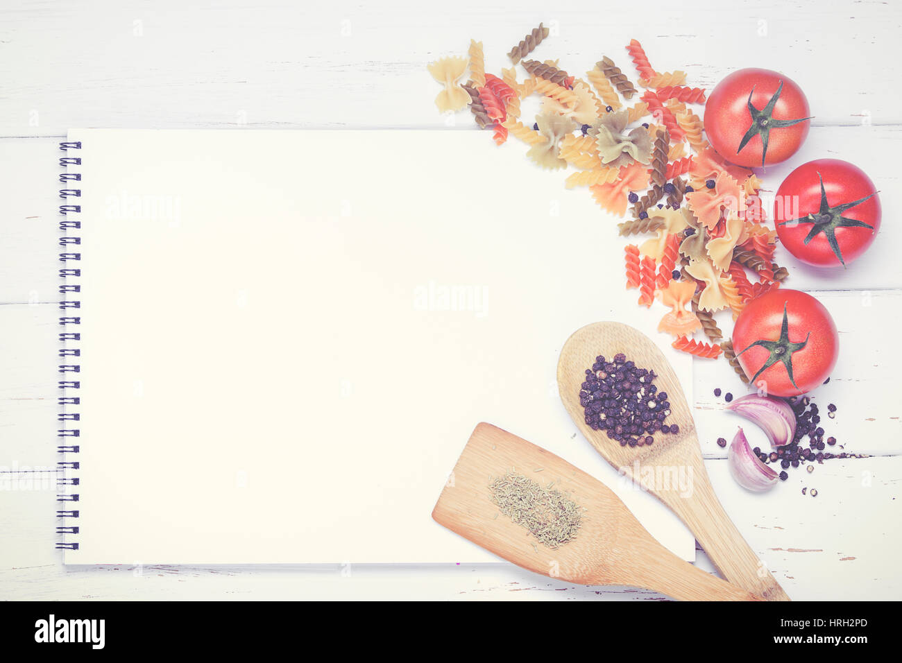 Open recipe book with ingredients Stock Photo - Alamy