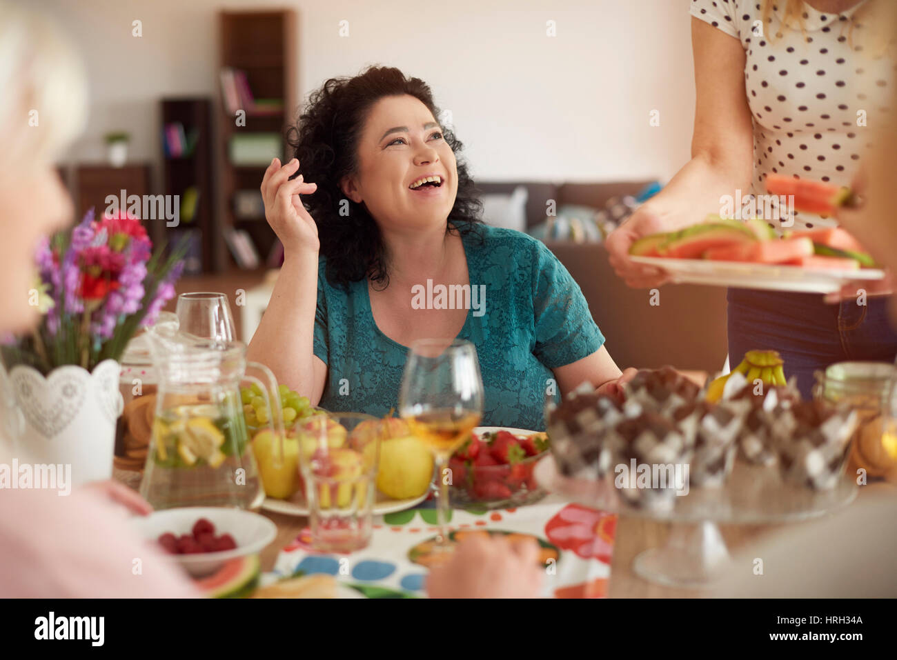 Mature group dining at home hi-res stock photography and images - Alamy