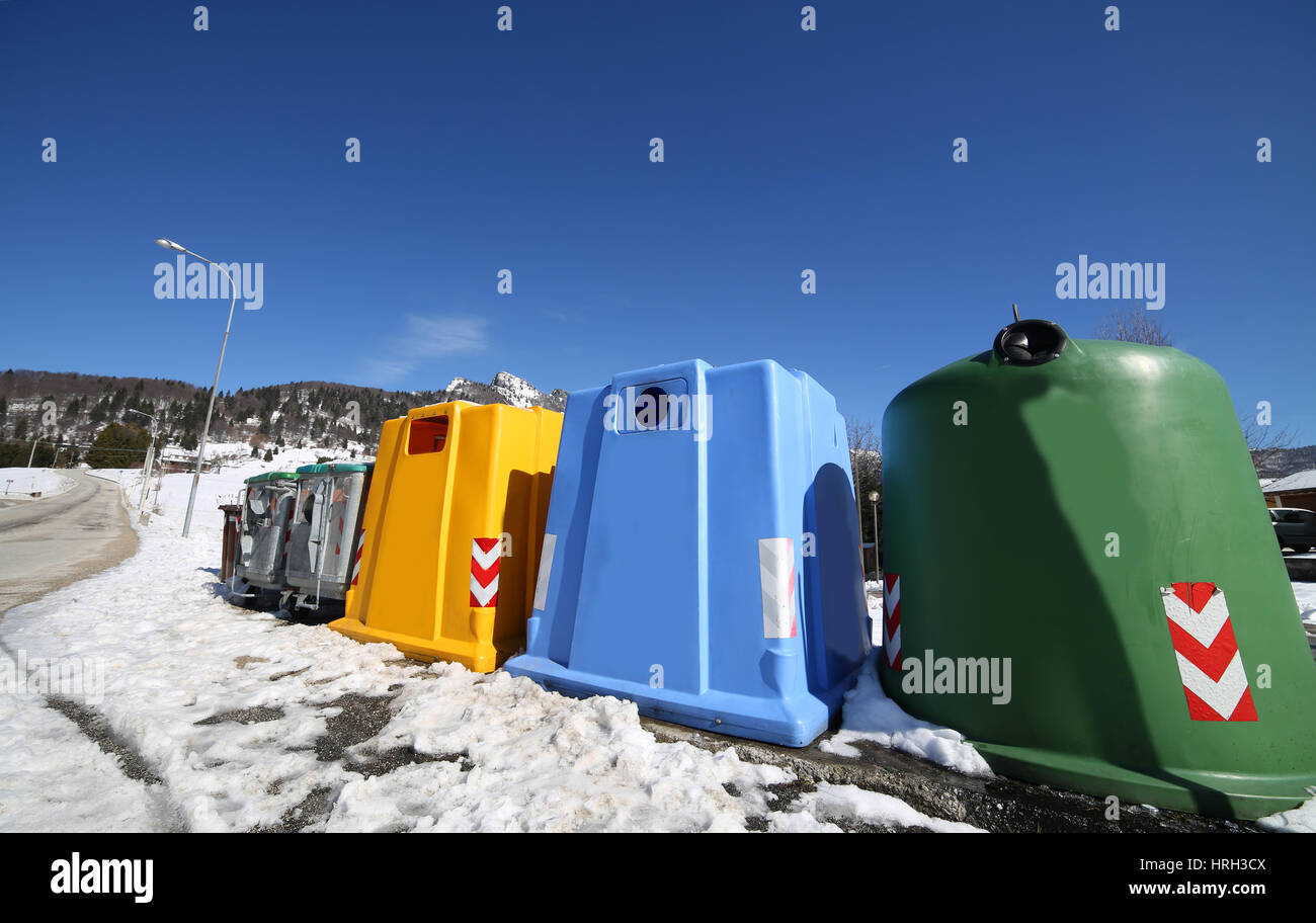 bins for the collection of waste in a mountain village in winter Stock ...