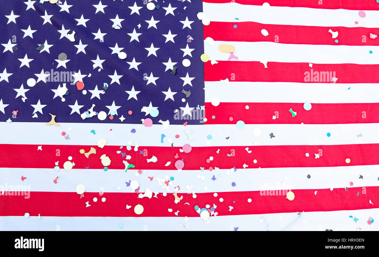 American flag stars and stripes with many colorful confetti during the ...