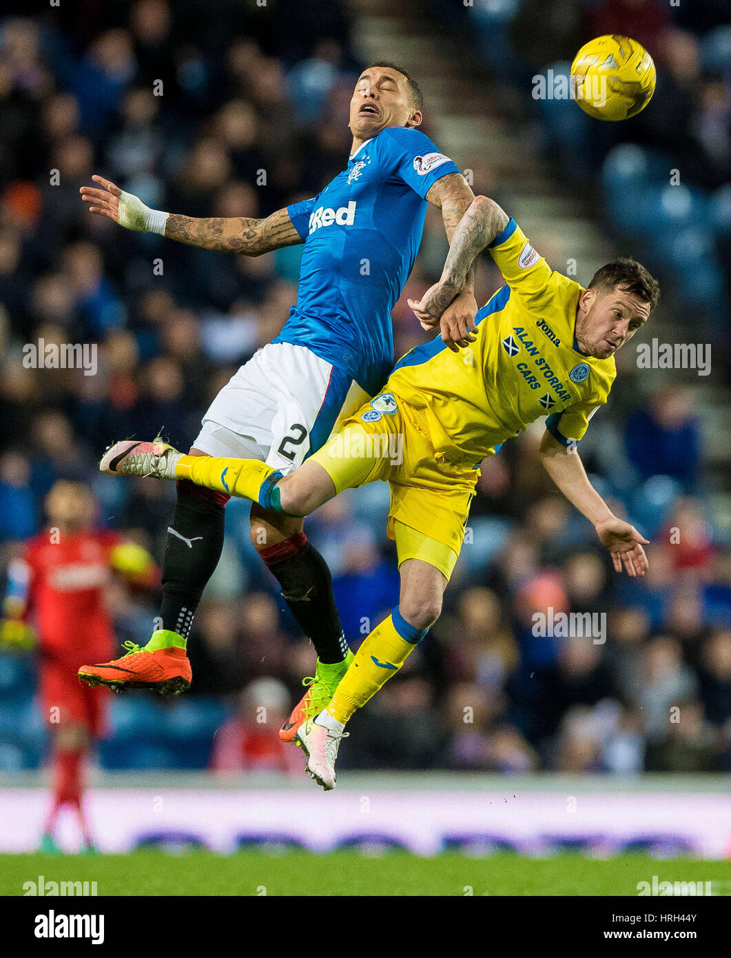 Rangers' James Tavernier (left) and St Johnstone's Danny Swanson ...
