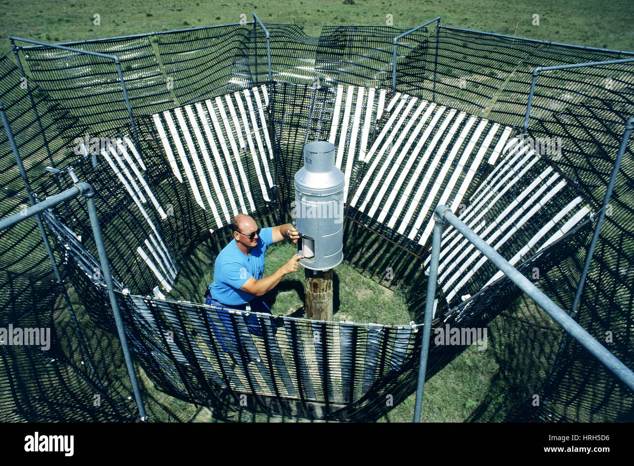 Meteorologist measuring rainfall Stock Photo - Alamy