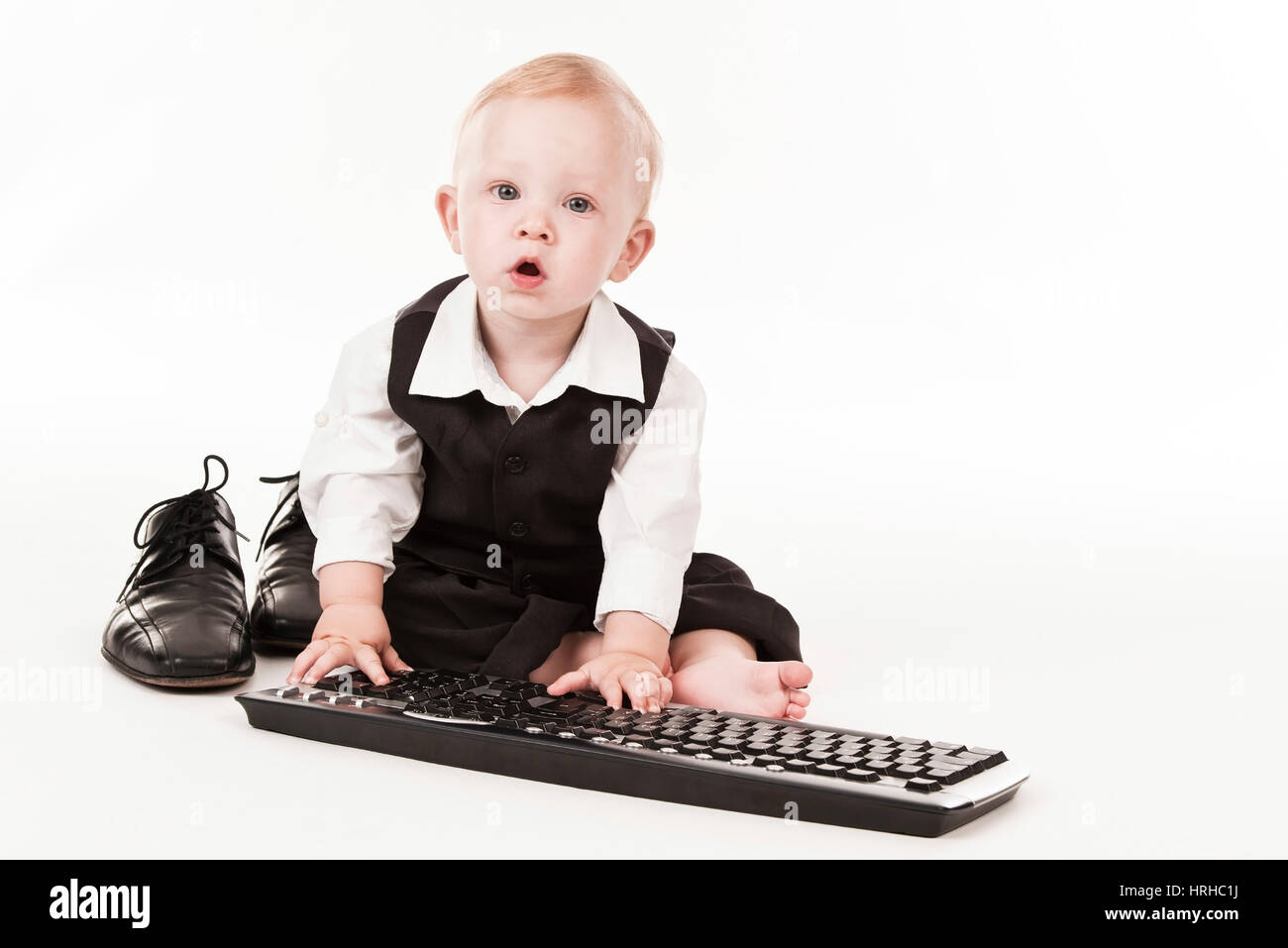 Kleinkind mit Computertastatur - little child with computer keyboard ...