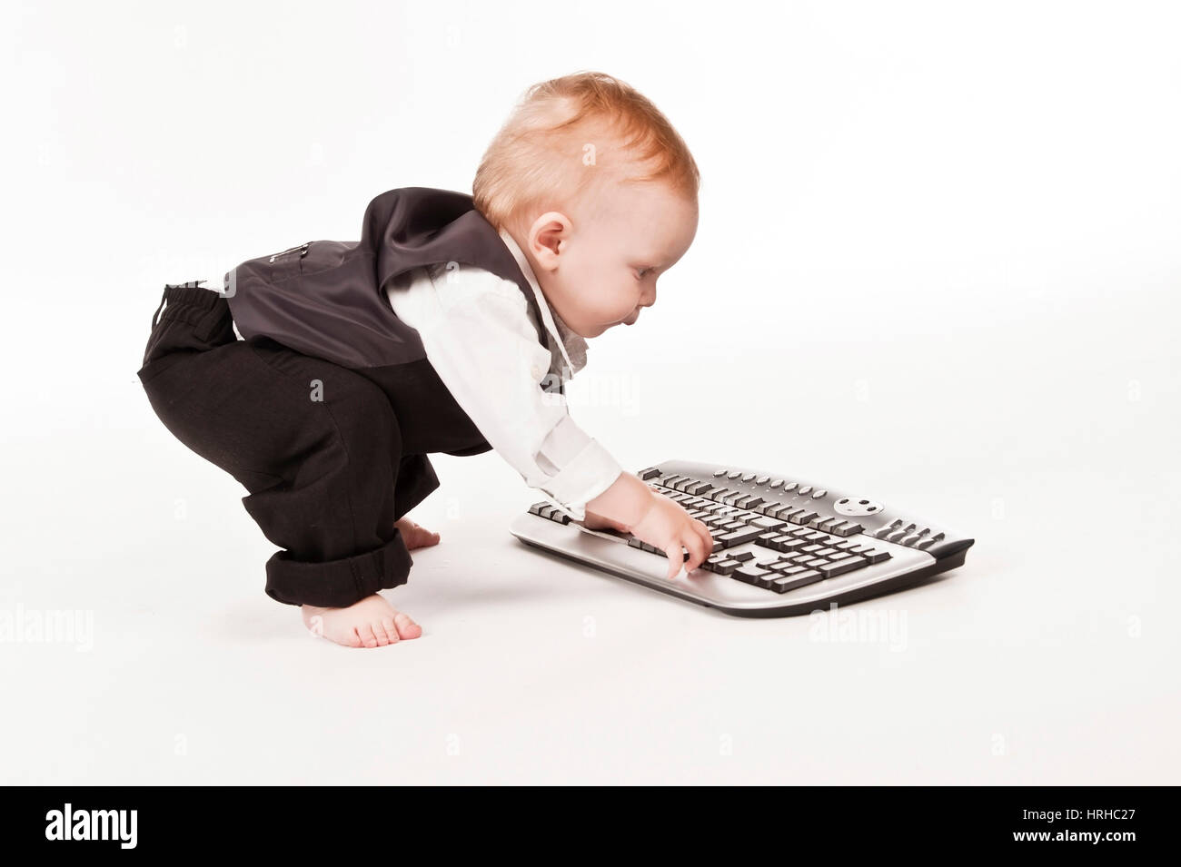 Kleinkind mit Computertastatur - little child with computer keyboard ...